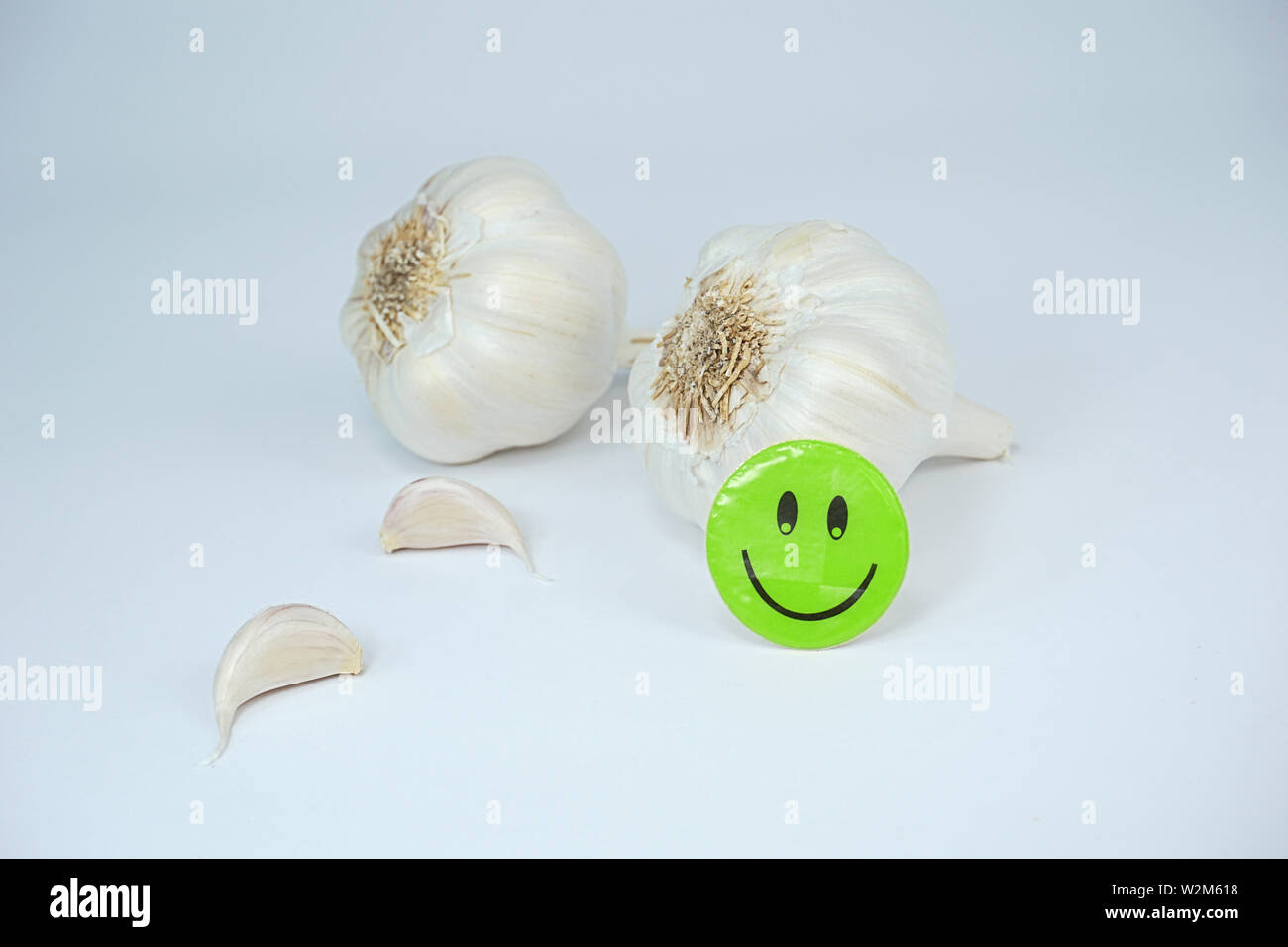 Fresh food, brown egg, garlic, red tomato, almonds Healthy Smiley Happy ...