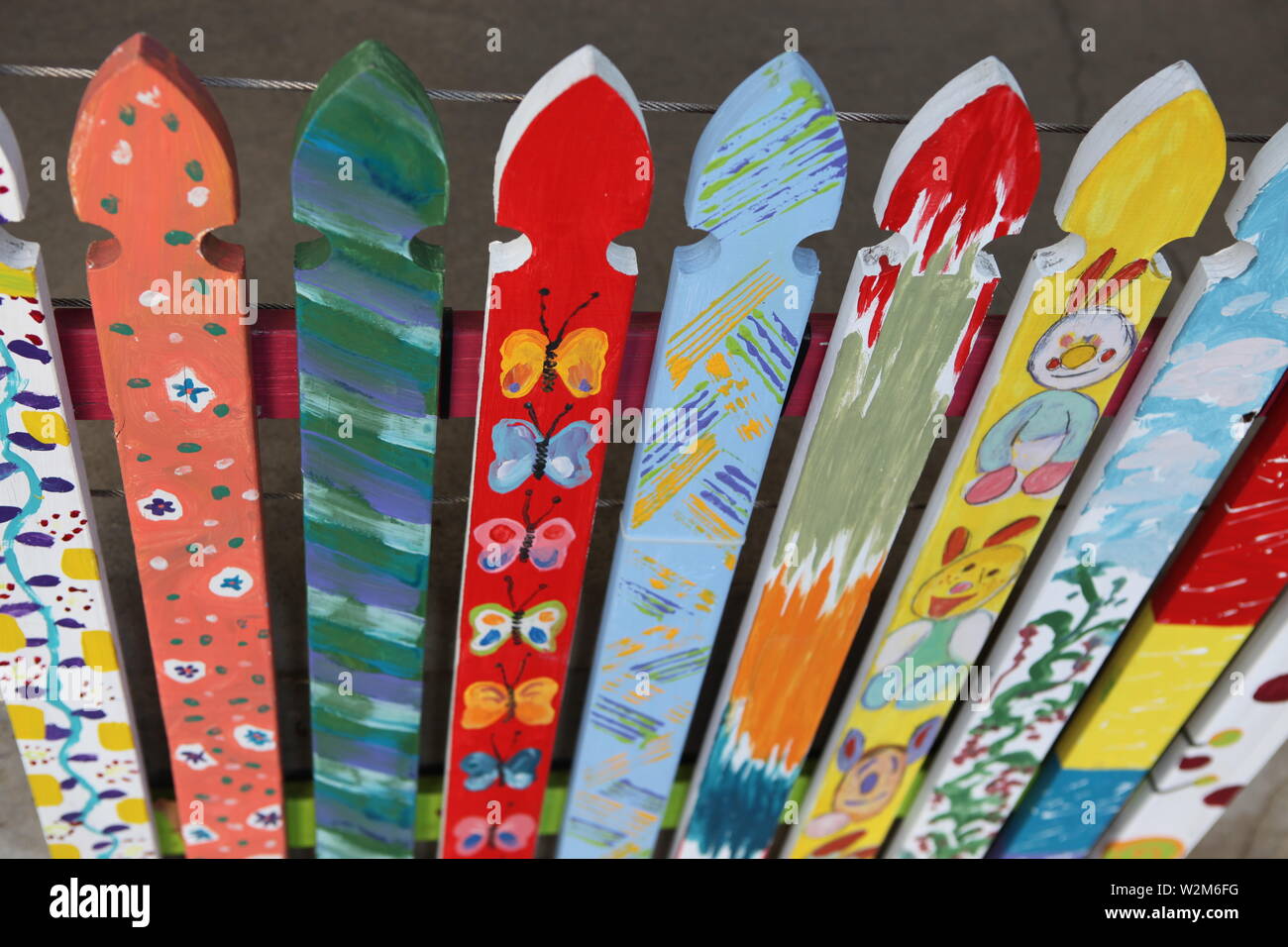 Colorful wooden fence Stock Photo - Alamy