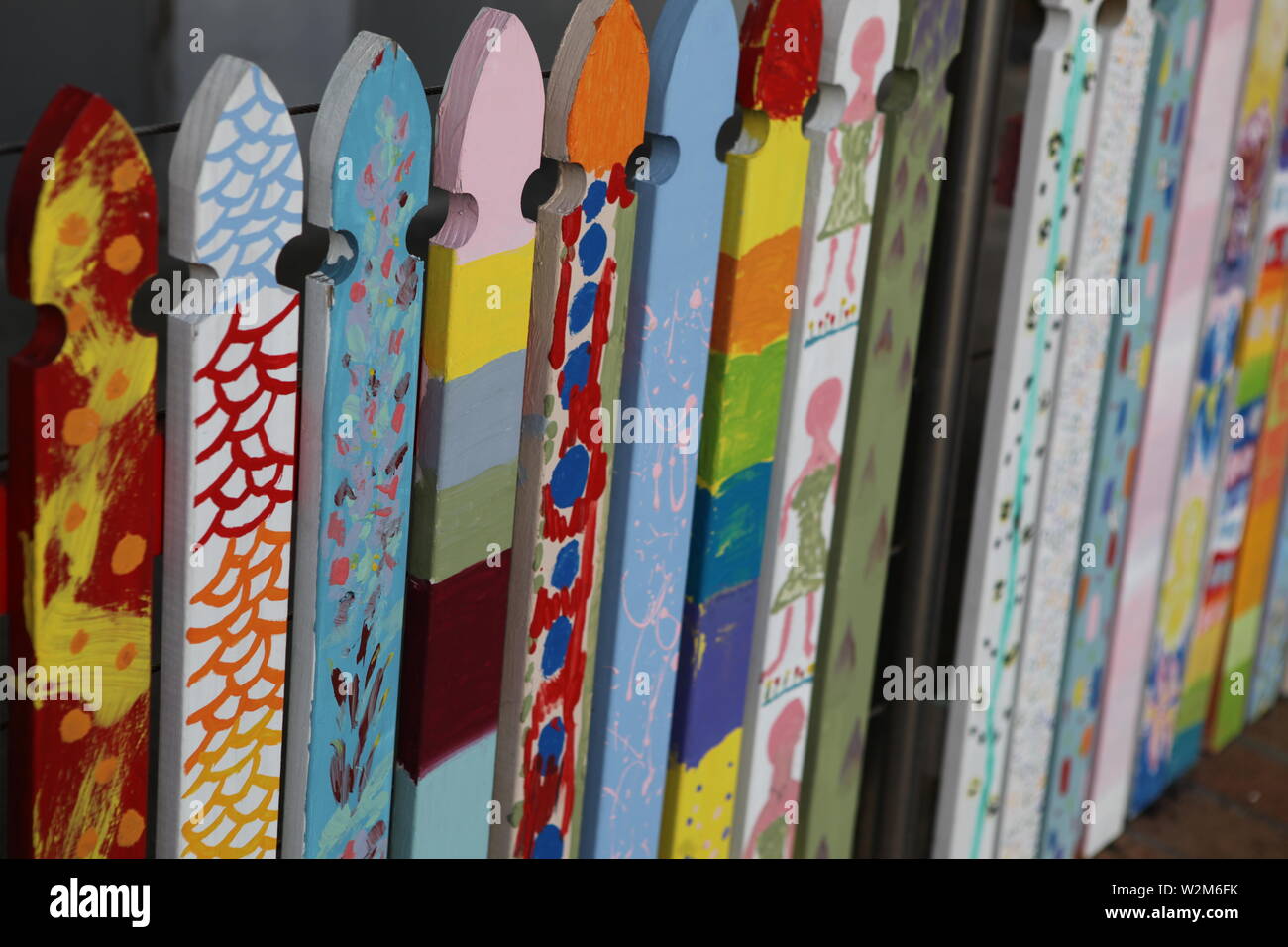 Colorful wooden fence Stock Photo - Alamy