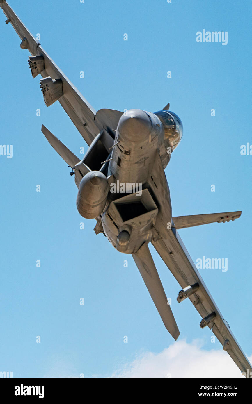 Airplane F-18 jet fighter flying at the California desert Stock Photo ...