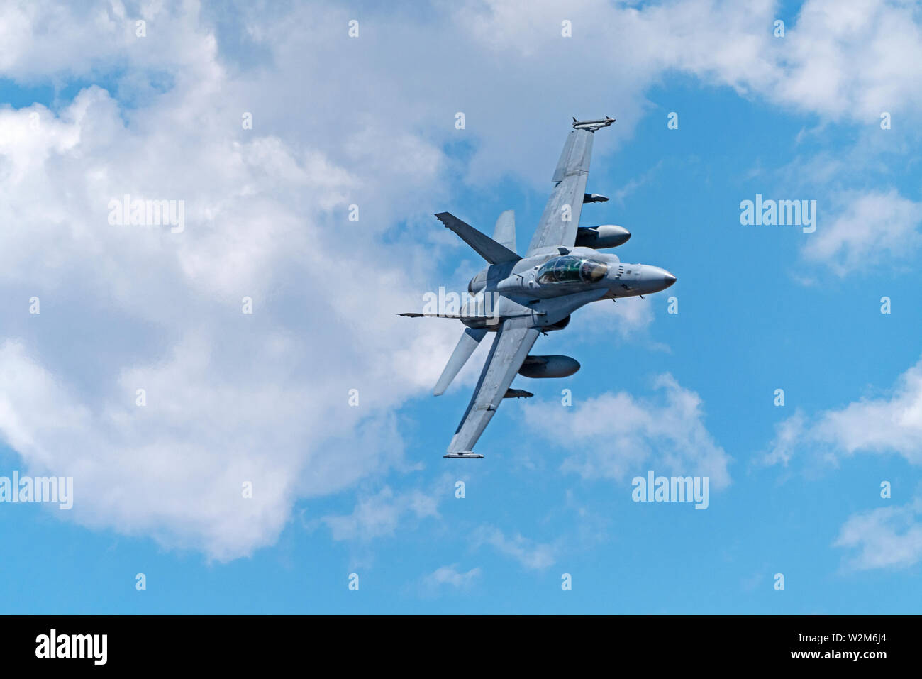 Airplane F-18 jet fighter flying at the California desert Stock Photo ...