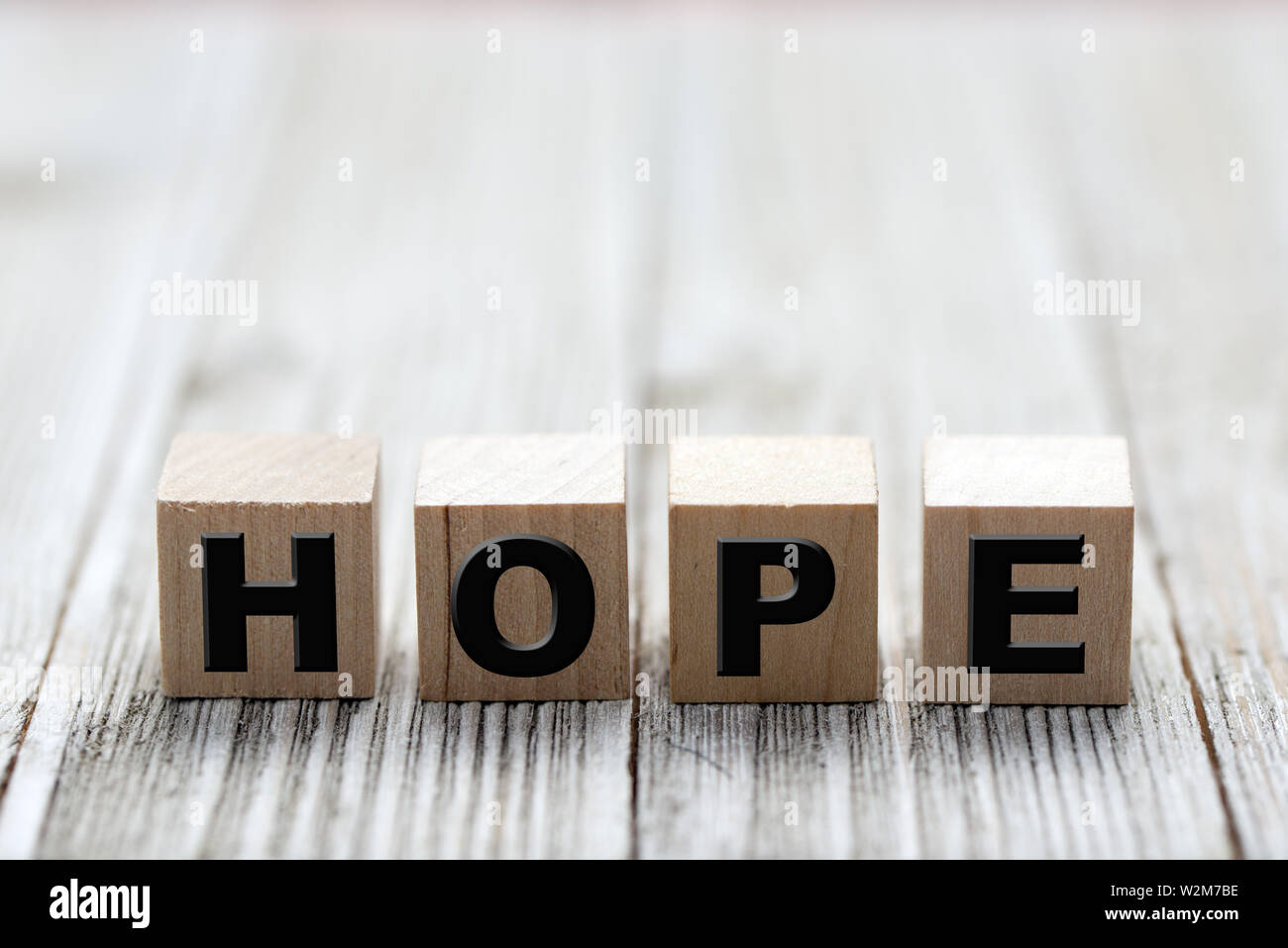 The word hope made of wooden cubes Stock Photo - Alamy