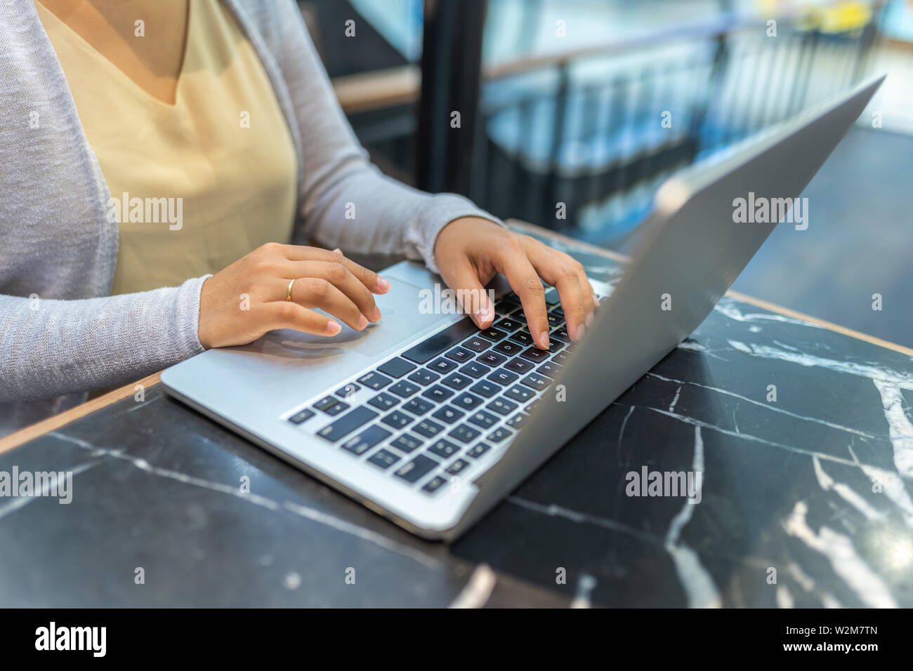 Woman hands using touchpad typing hi-res stock photography and images ...