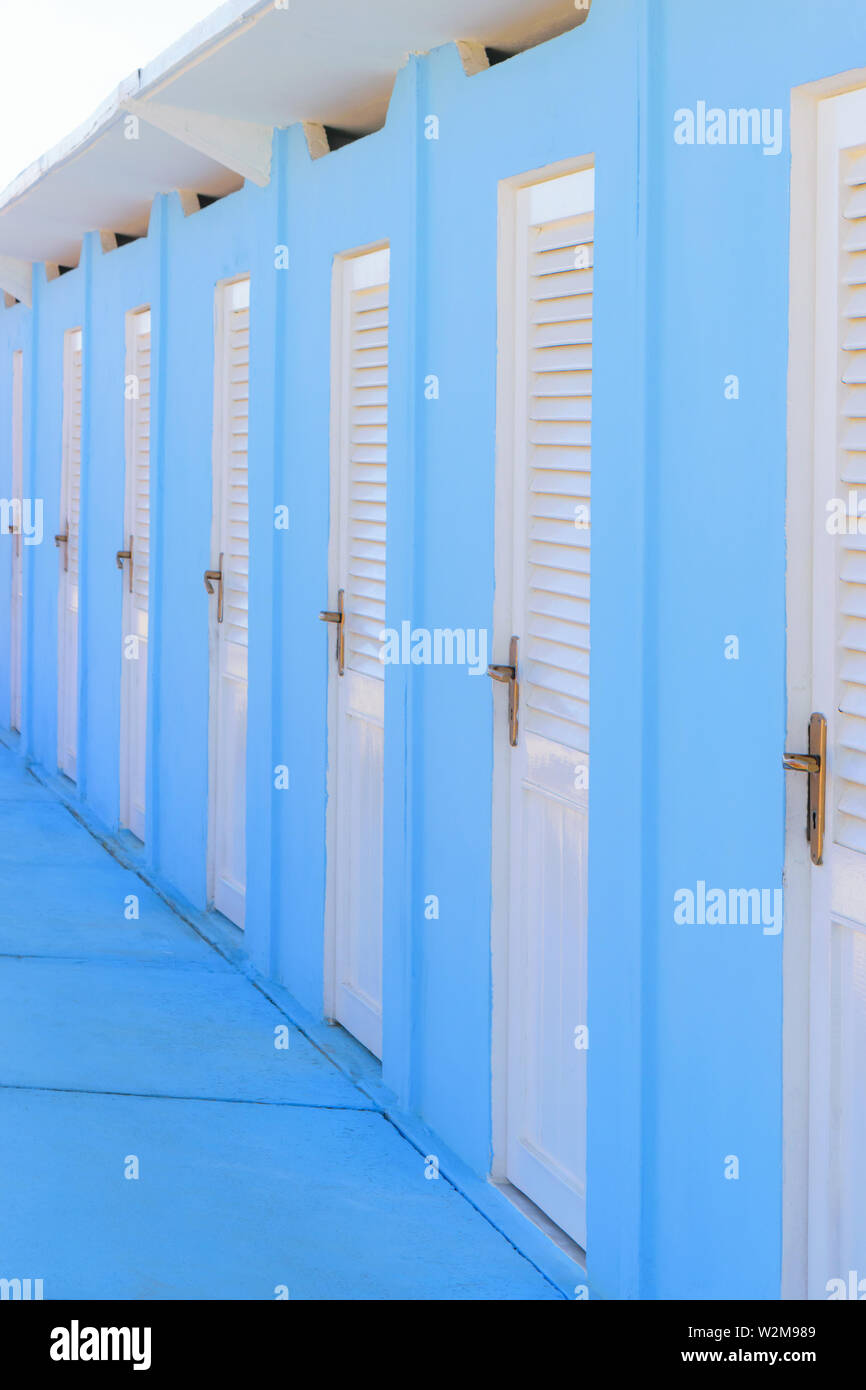 Soft blue color beach huts with white doors in Rimini beach resort ...
