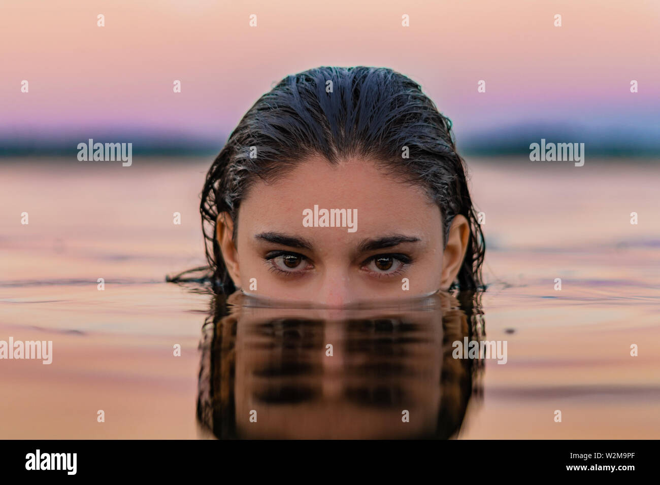 Woman in water Stock Photo - Alamy