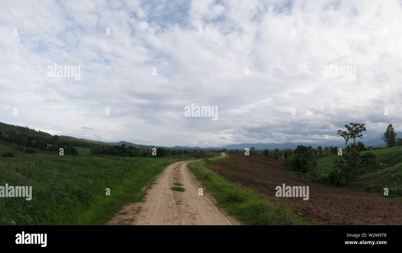 The rural route at the time before the light in the wet rainy season ...