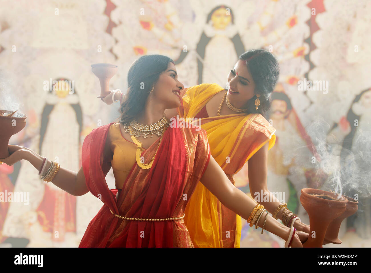 Two Married bengali women performing dhunuchi dance on the occasion of ...