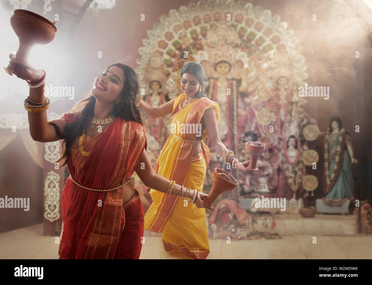 Two Married bengali women performing dhunuchi dance on the occasion of ...