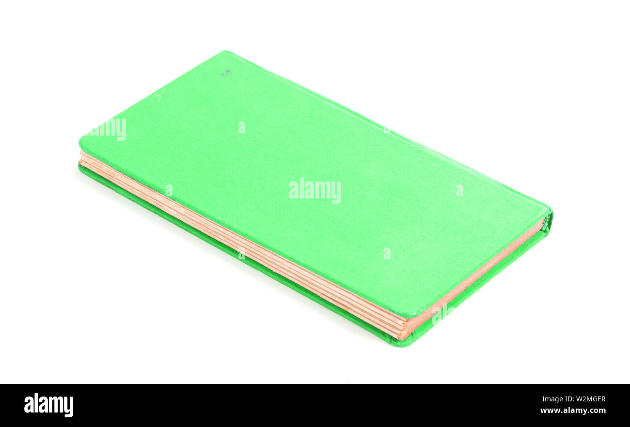 Closed old green book isolated on white background Stock Photo - Alamy