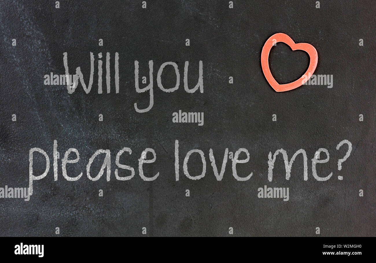Blackboard with small red heart in the corner - Will you please love me ...