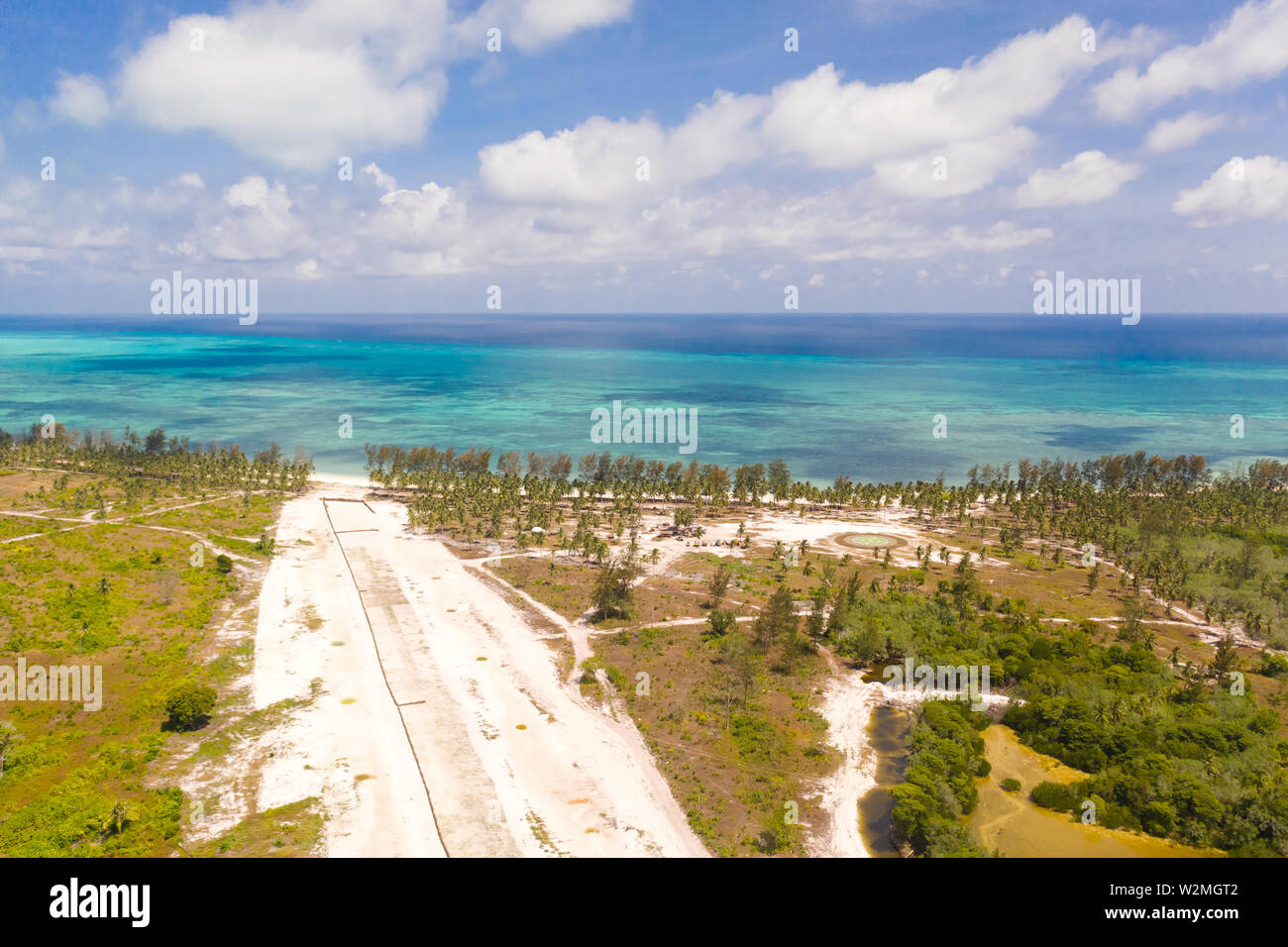 Runway on a tropical island, view from above. Balabac, Palawan ...