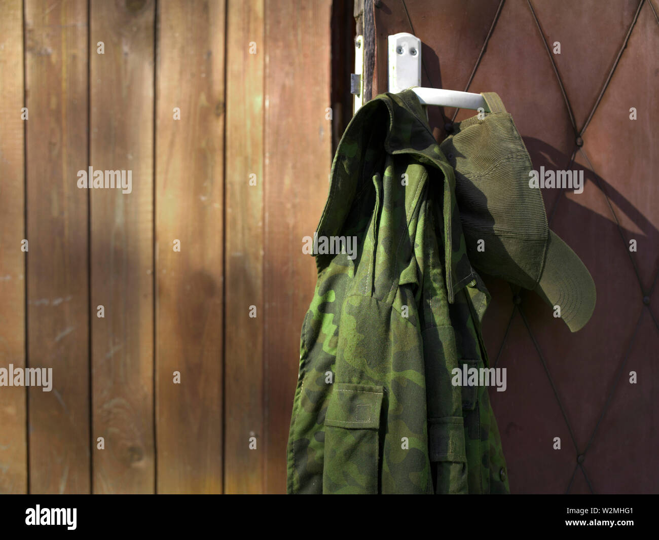 Camouflage jacket hanging hi-res stock photography and images - Alamy