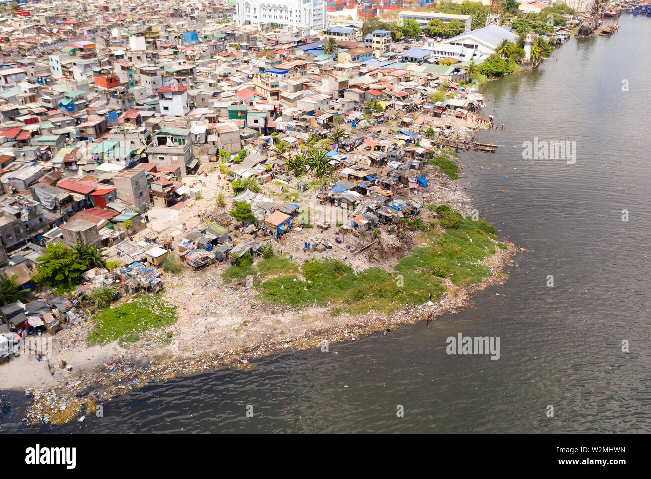 Slums in Manila, a top view. Sea pollution by household waste. Plastic ...