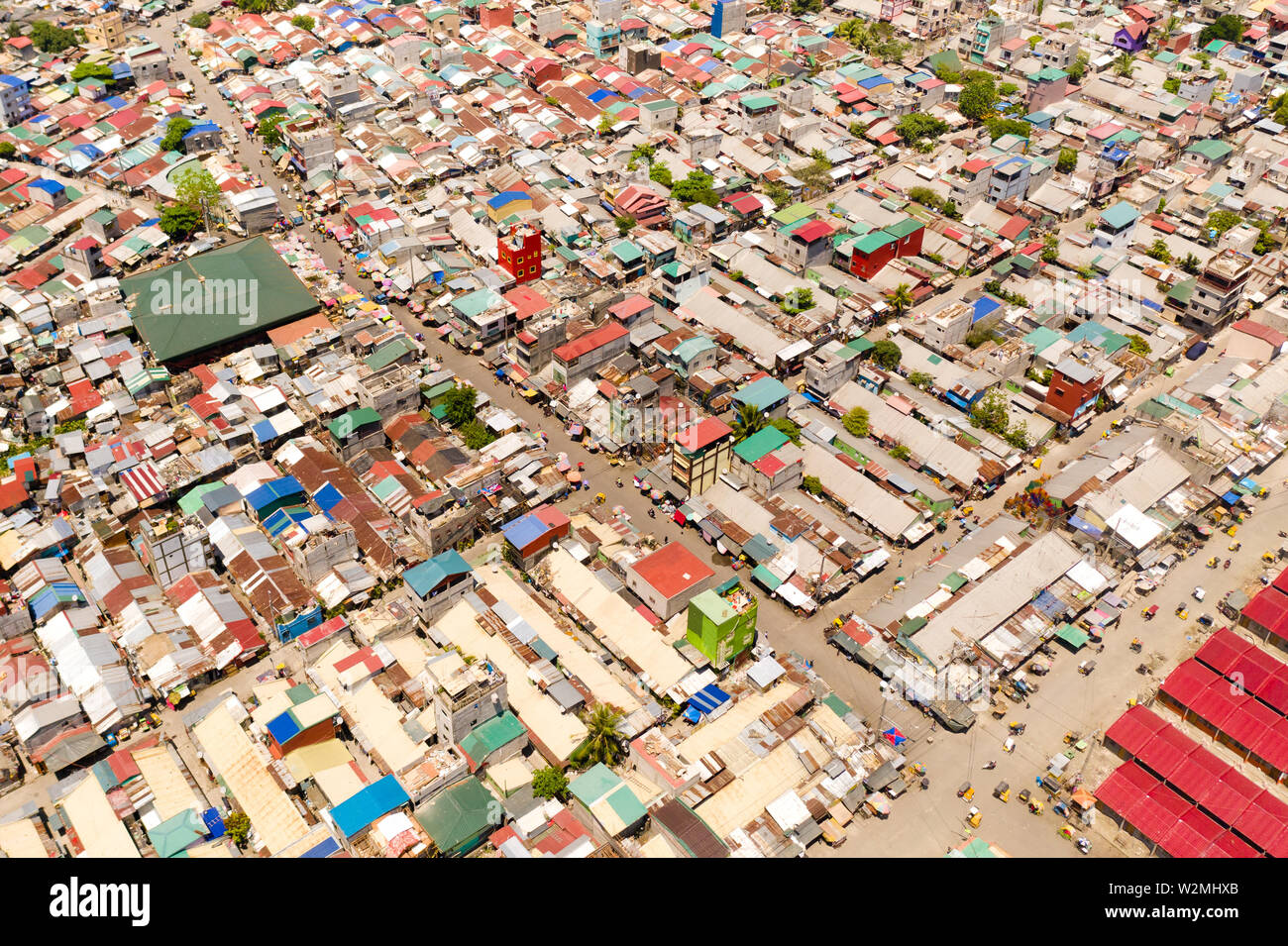 Streets of poor areas in Manila. The roofs of houses and the life of ...
