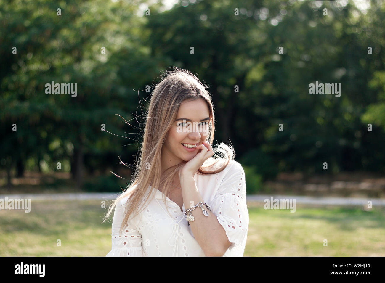 portrait of a cute girl smiling in the camera Stock Photo - Alamy
