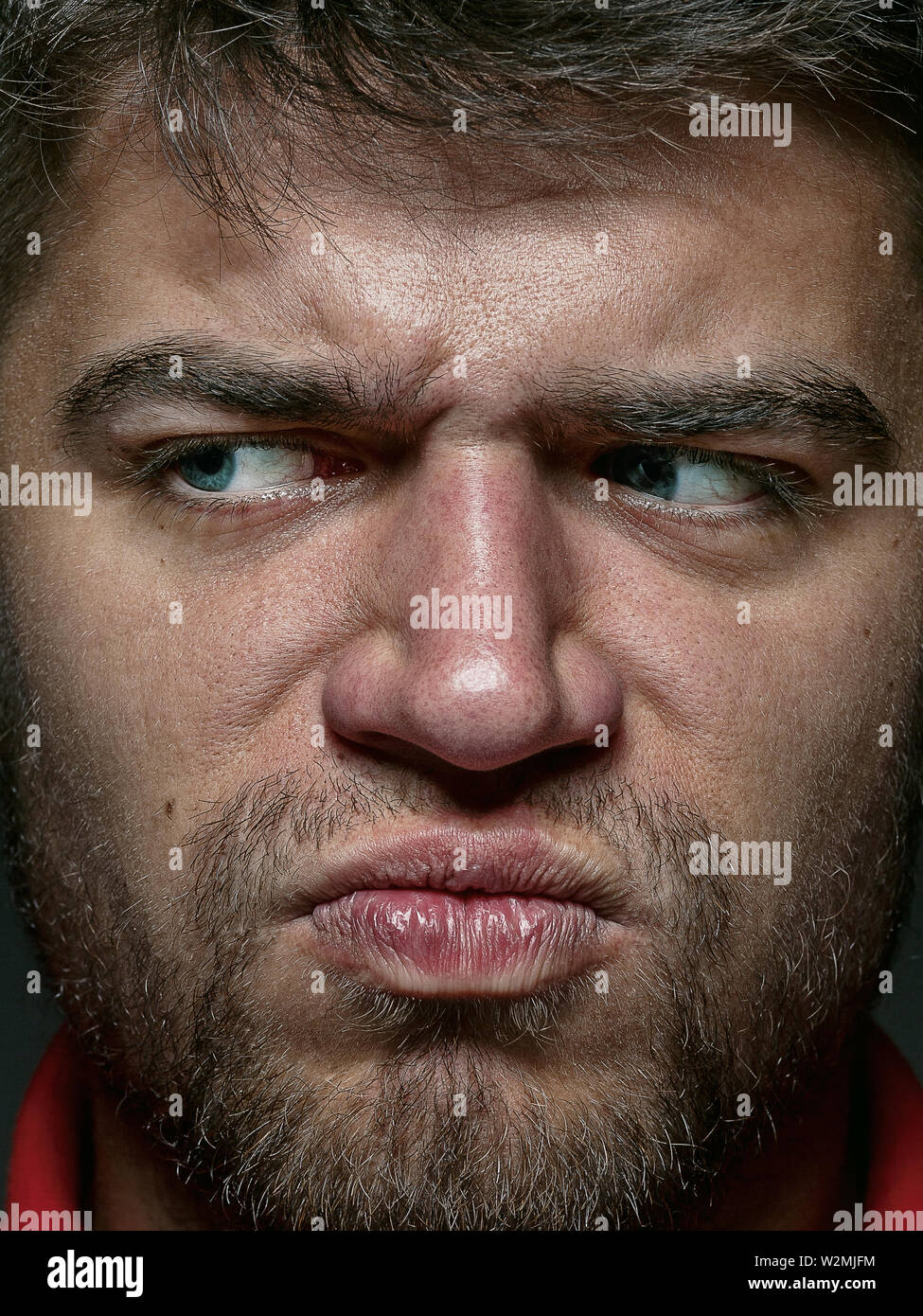 Close up portrait of young and emotional caucasian man. Highly detail ...