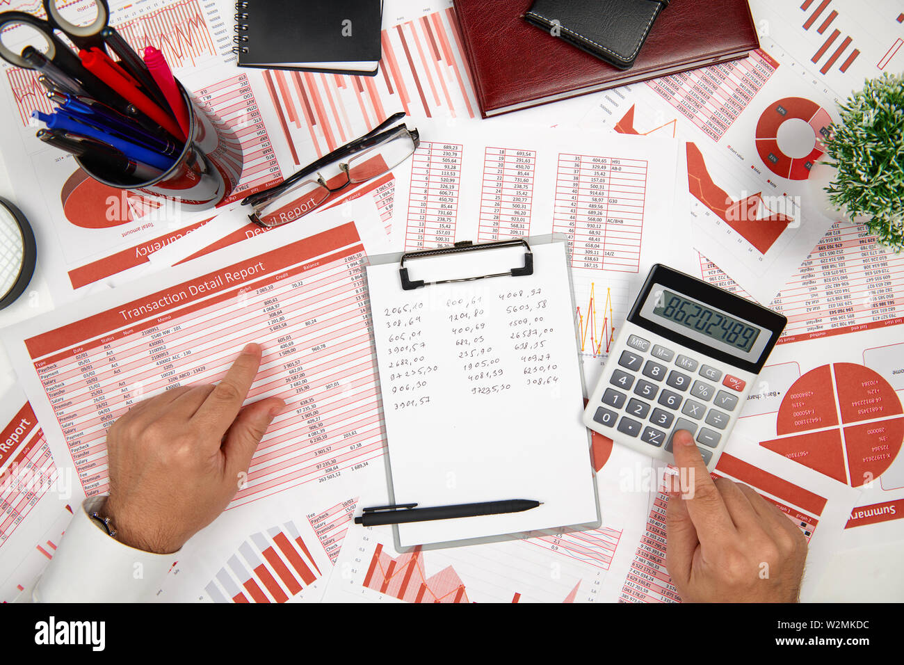 Business reports, data tables and charts - directly above view of ...