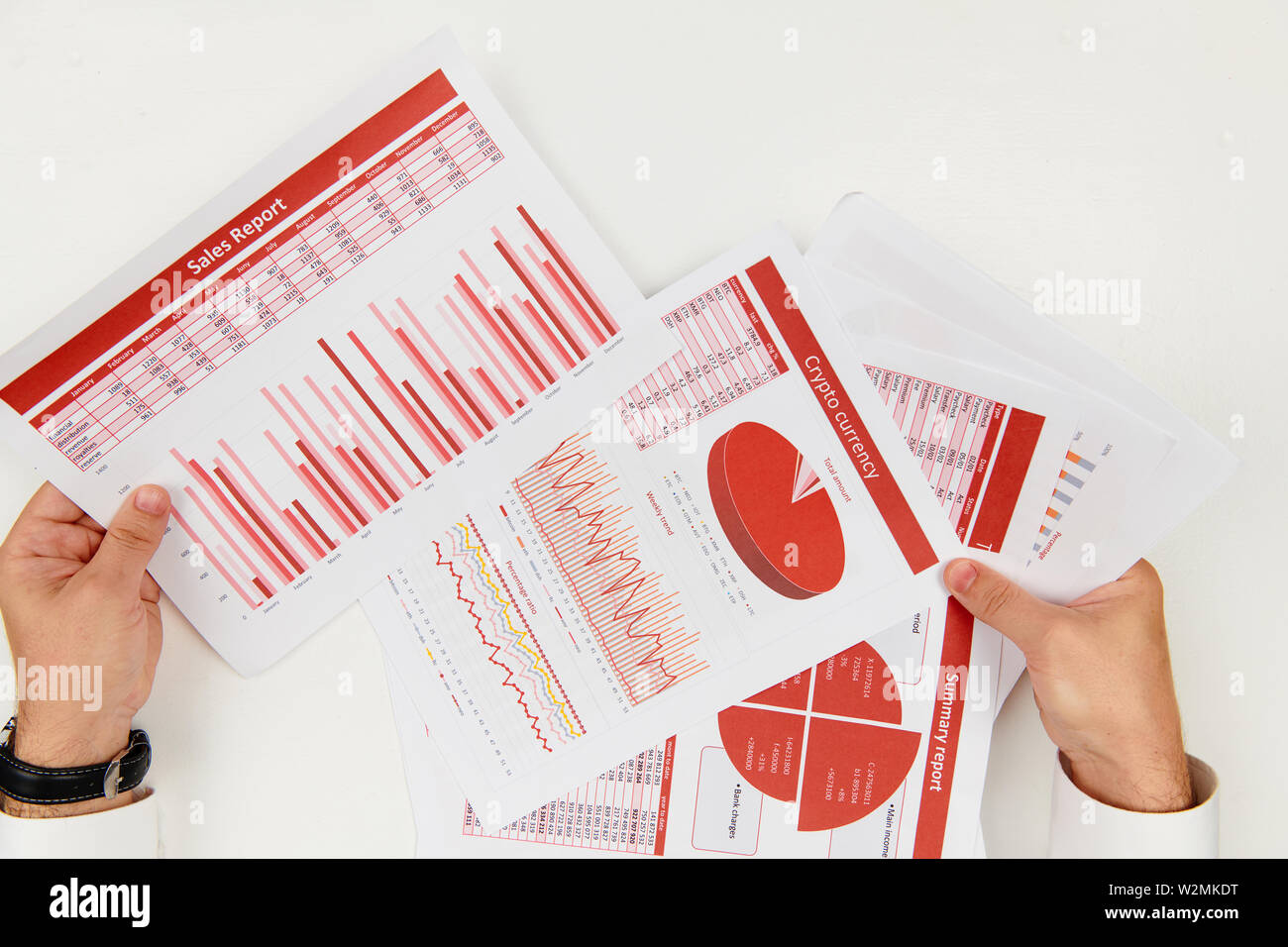 Business reports, data tables and charts - directly above view of ...
