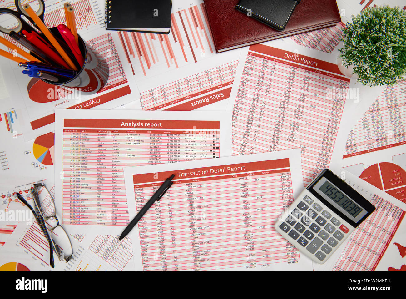 Business reports, data tables and charts - directly above view of ...