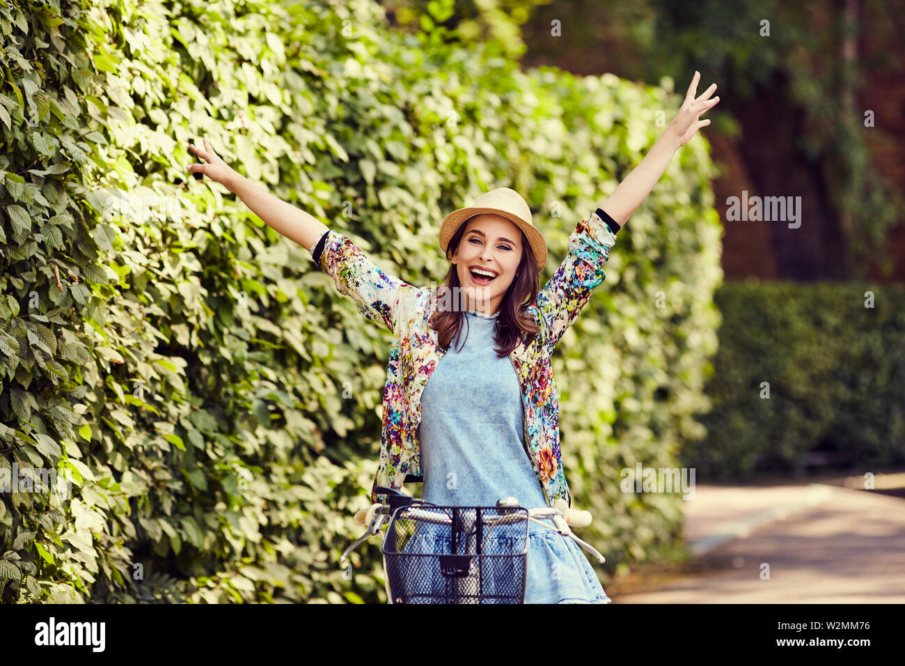 Girl having fun riding bicycle hi-res stock photography and images - Alamy