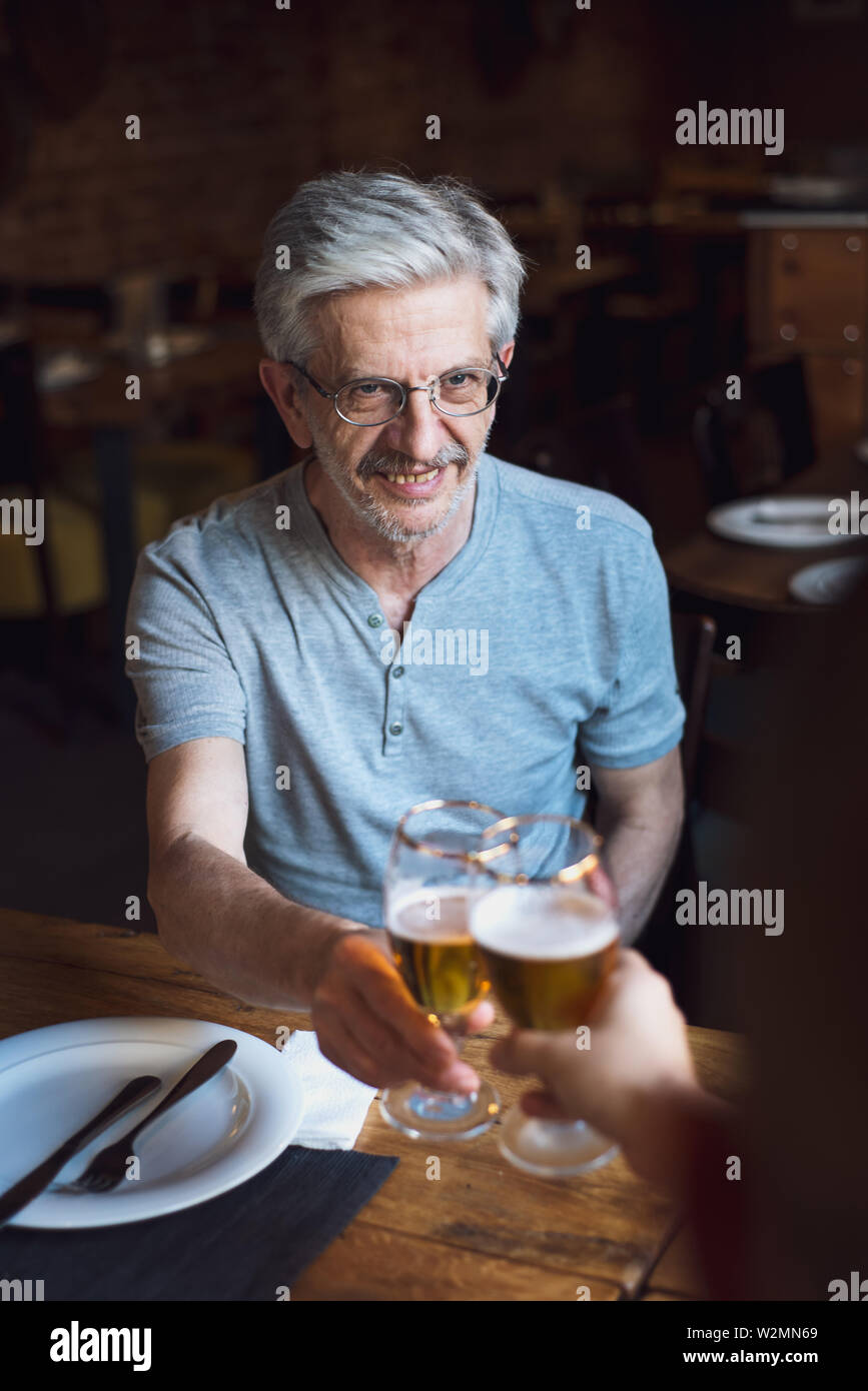 Happy man drinking beer in hi-res stock photography and images - Alamy