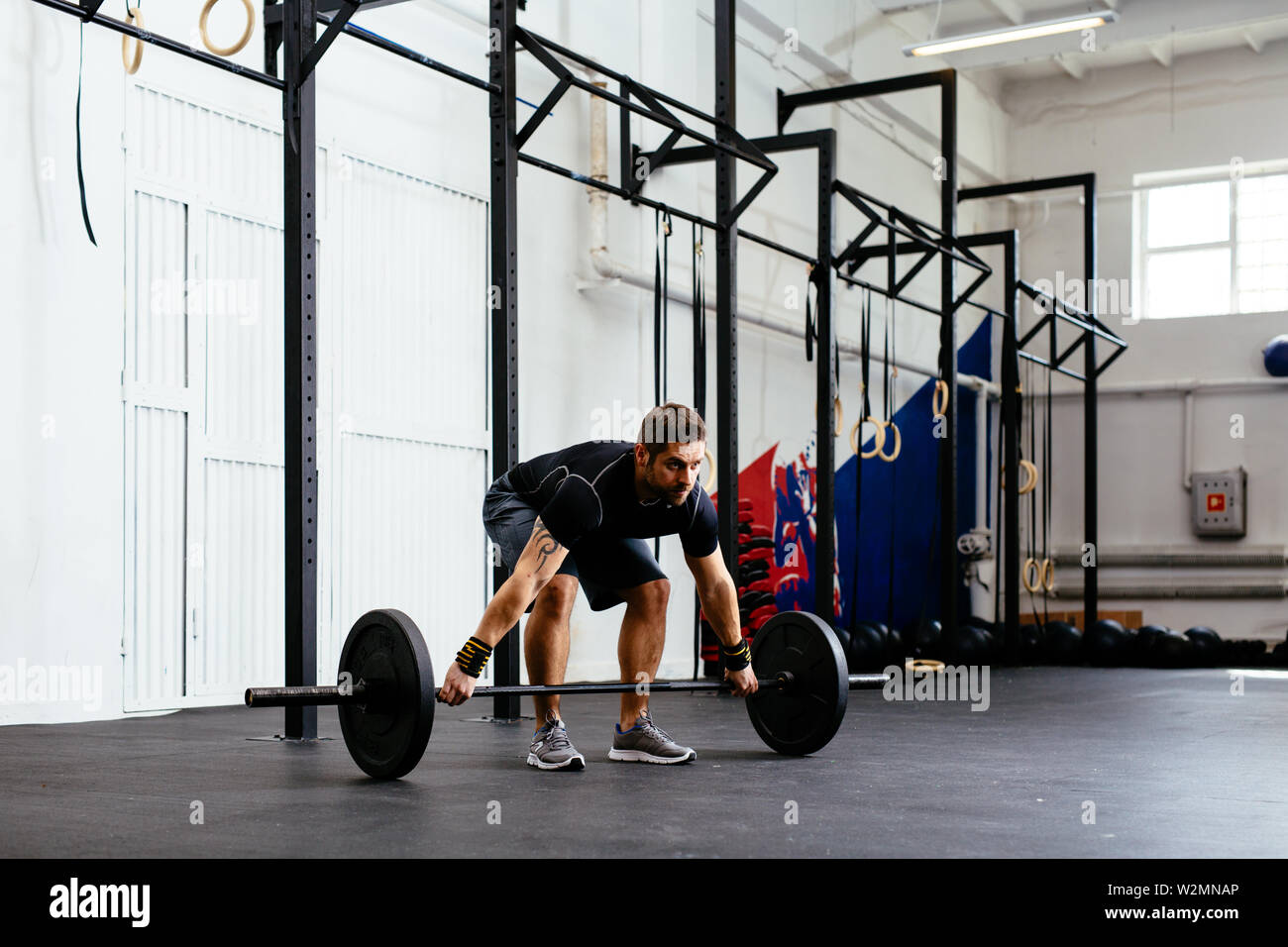 Man lift barbell gym hi-res stock photography and images - Alamy