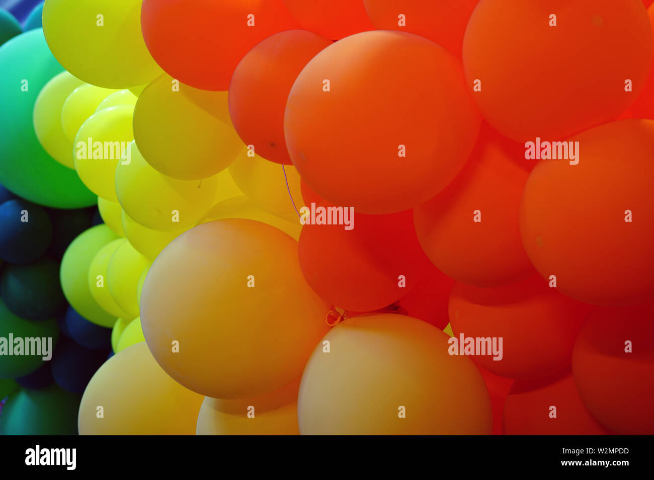 Colorful green and multicolor balloons at a party Stock Photo - Alamy