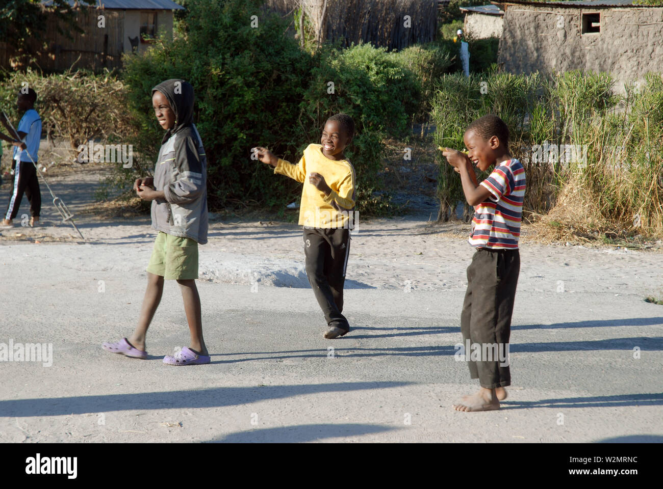 Boys playing in the main street, Mwandi, Zambia, Africa Stock Photo - Alamy