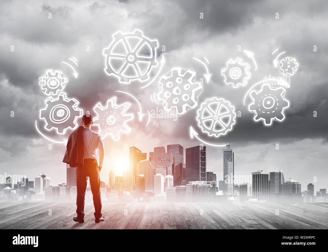 Cogwheel engine drawn on screen as symbol for teamwork and cooperation ...