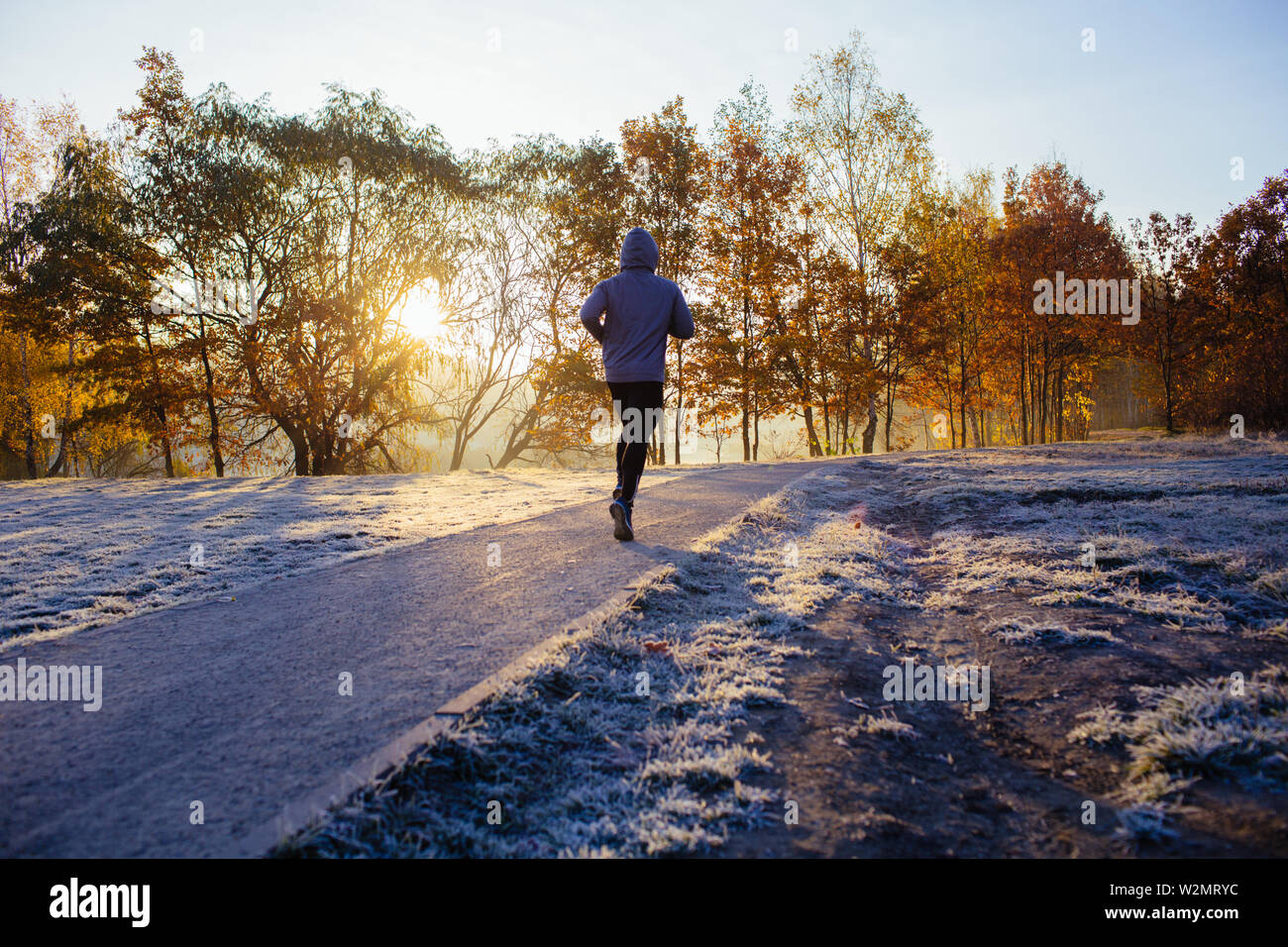 Athletic man running sunset hi-res stock photography and images - Alamy