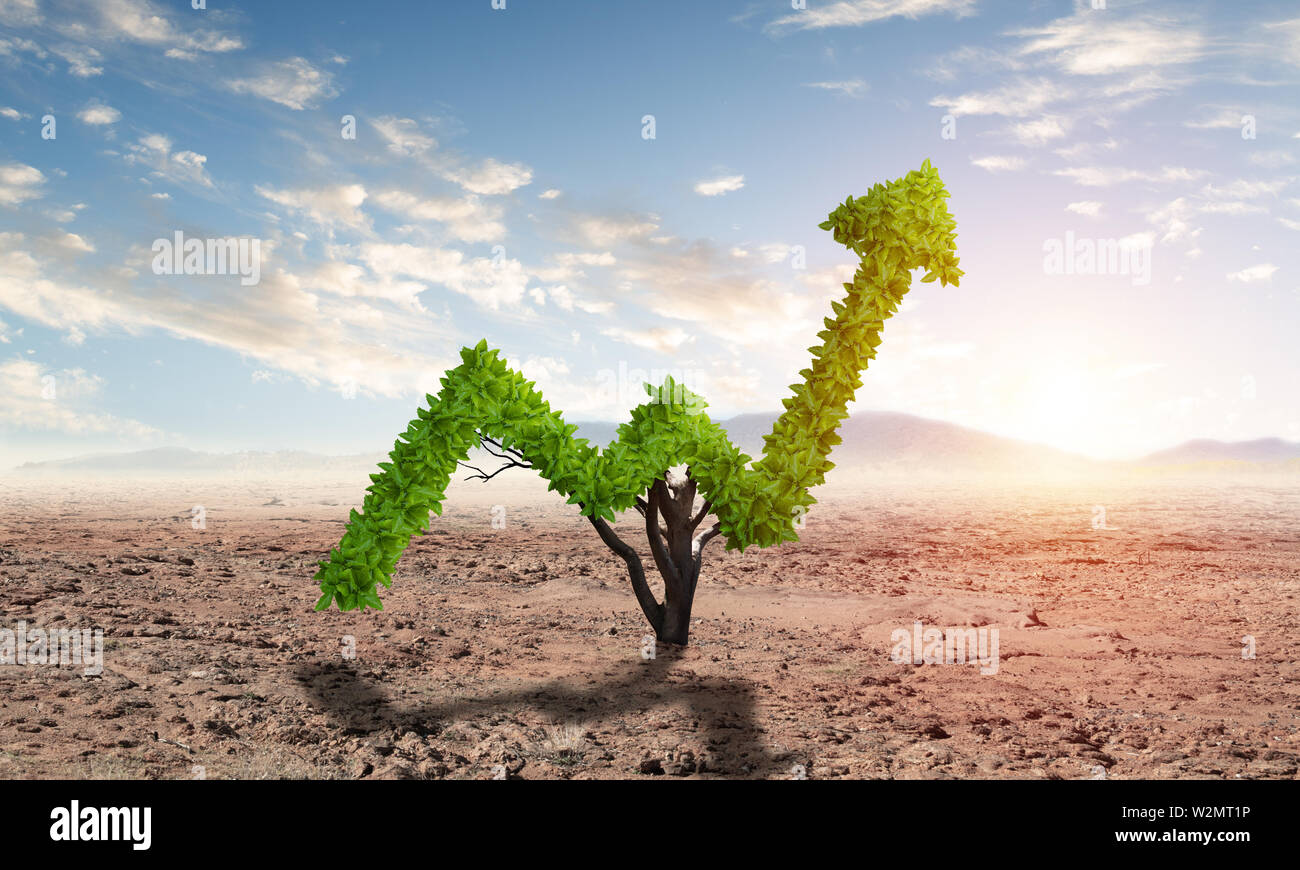 Green plant in shape of of grow up trend in desert Stock Photo - Alamy