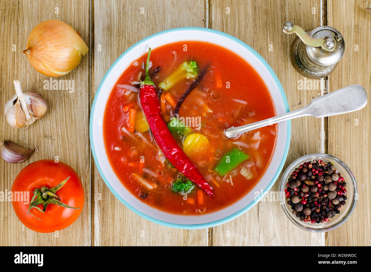 Spicy tomato vegetable soup, top view Stock Photo - Alamy
