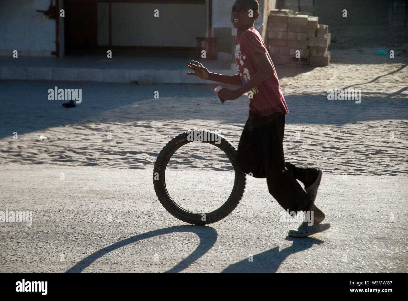 Young Boy hoop rolling, Mwandi, Zambia, Africa Stock Photo - Alamy