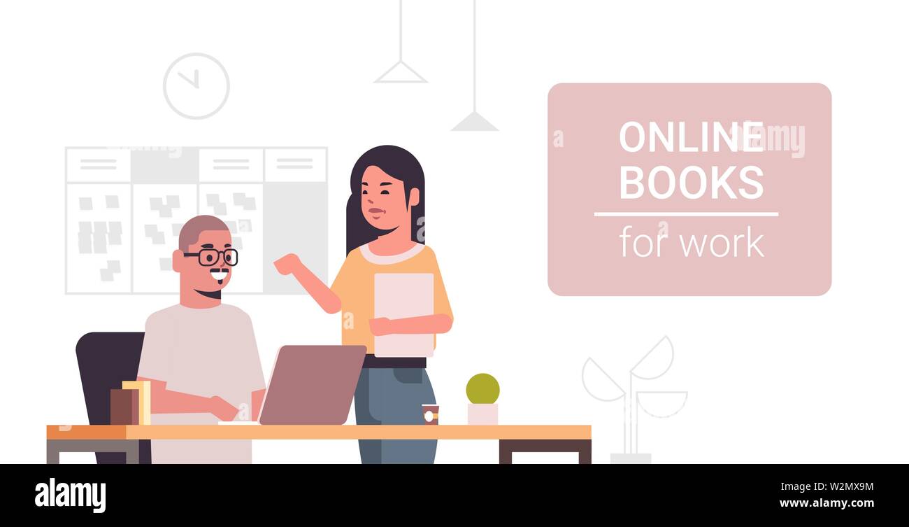 business colleagues using laptop at workplace desk couple reading ...