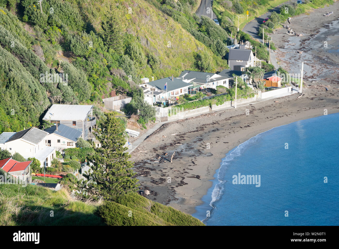 Houses beside the sea at Pukerua Bay, from the Escarpment Walkway ...
