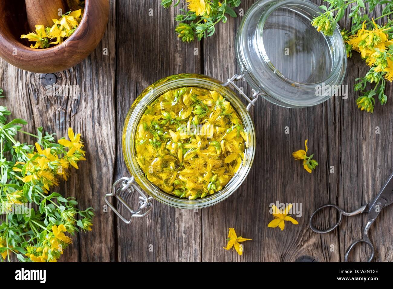 Oil glass jar flowers hi-res stock photography and images - Alamy