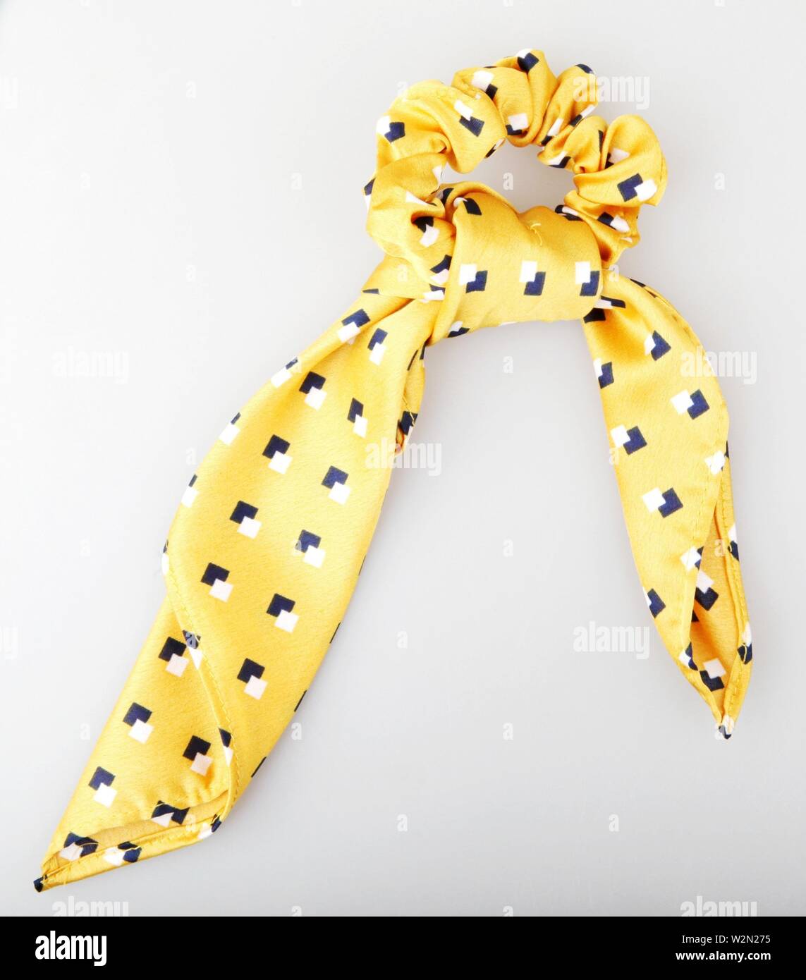 Yellow hair ribbon hi-res stock photography and images - Alamy