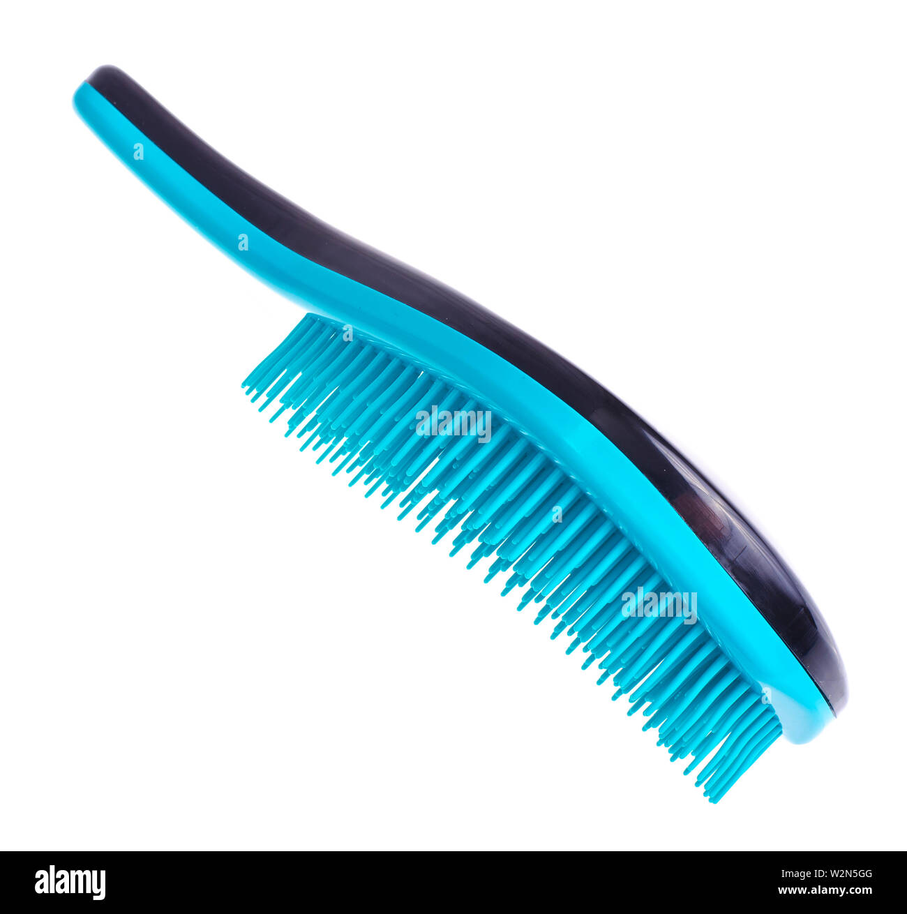 Blue comb for combing pet hair Stock Photo - Alamy