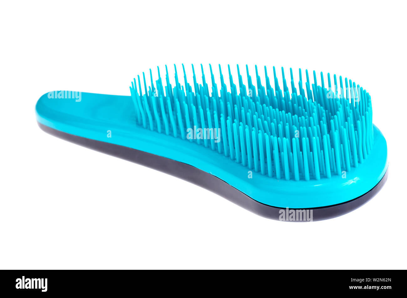Blue comb for combing pet hair Stock Photo - Alamy