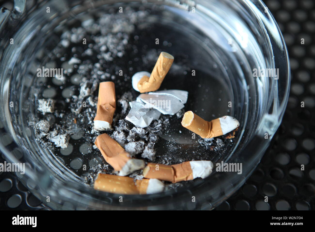 Cigarettes, smoke, anti-smoking campaign, ash tray Stock Photo - Alamy