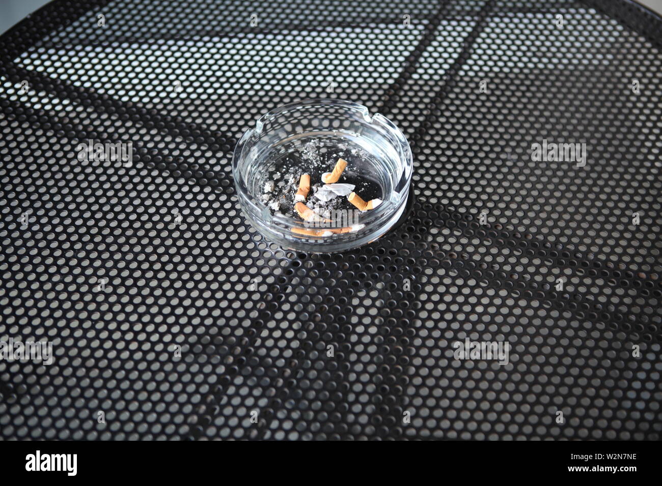 Cigarettes, smoke, anti-smoking campaign, ash tray Stock Photo - Alamy