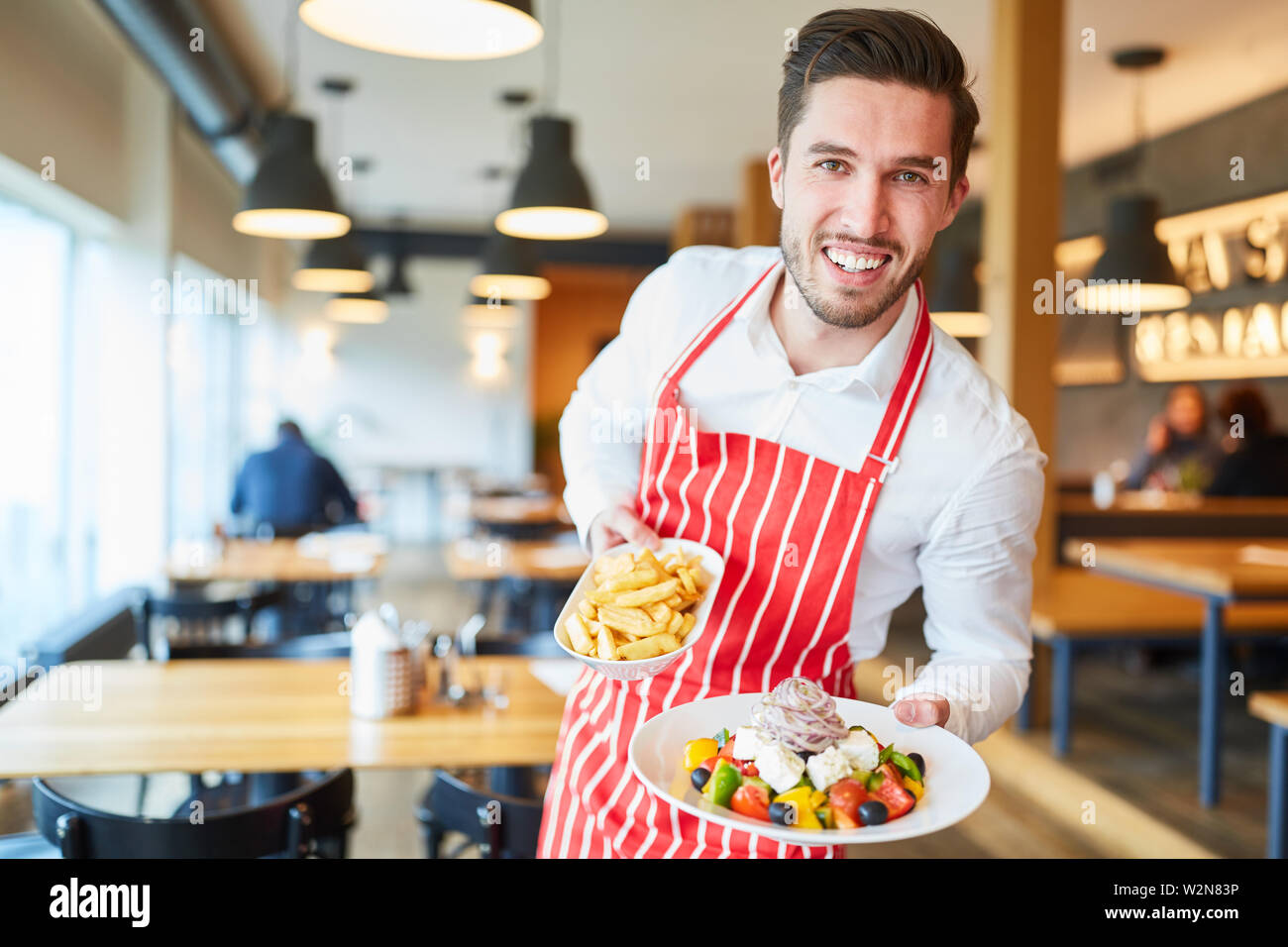 Waiter appetizer restaurant hi-res stock photography and images - Alamy