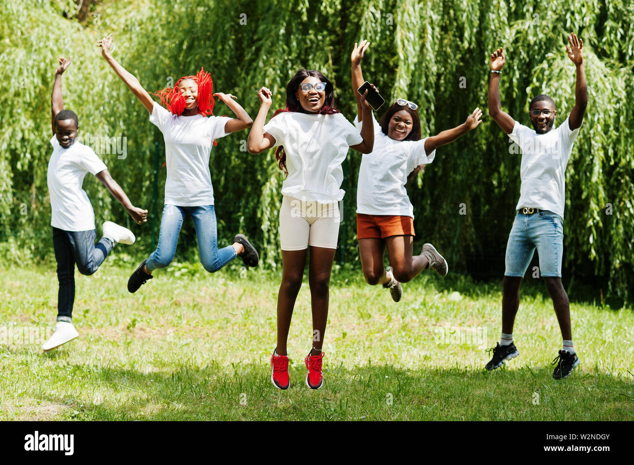 Group of women in white t shirts hi-res stock photography and images - Alamy