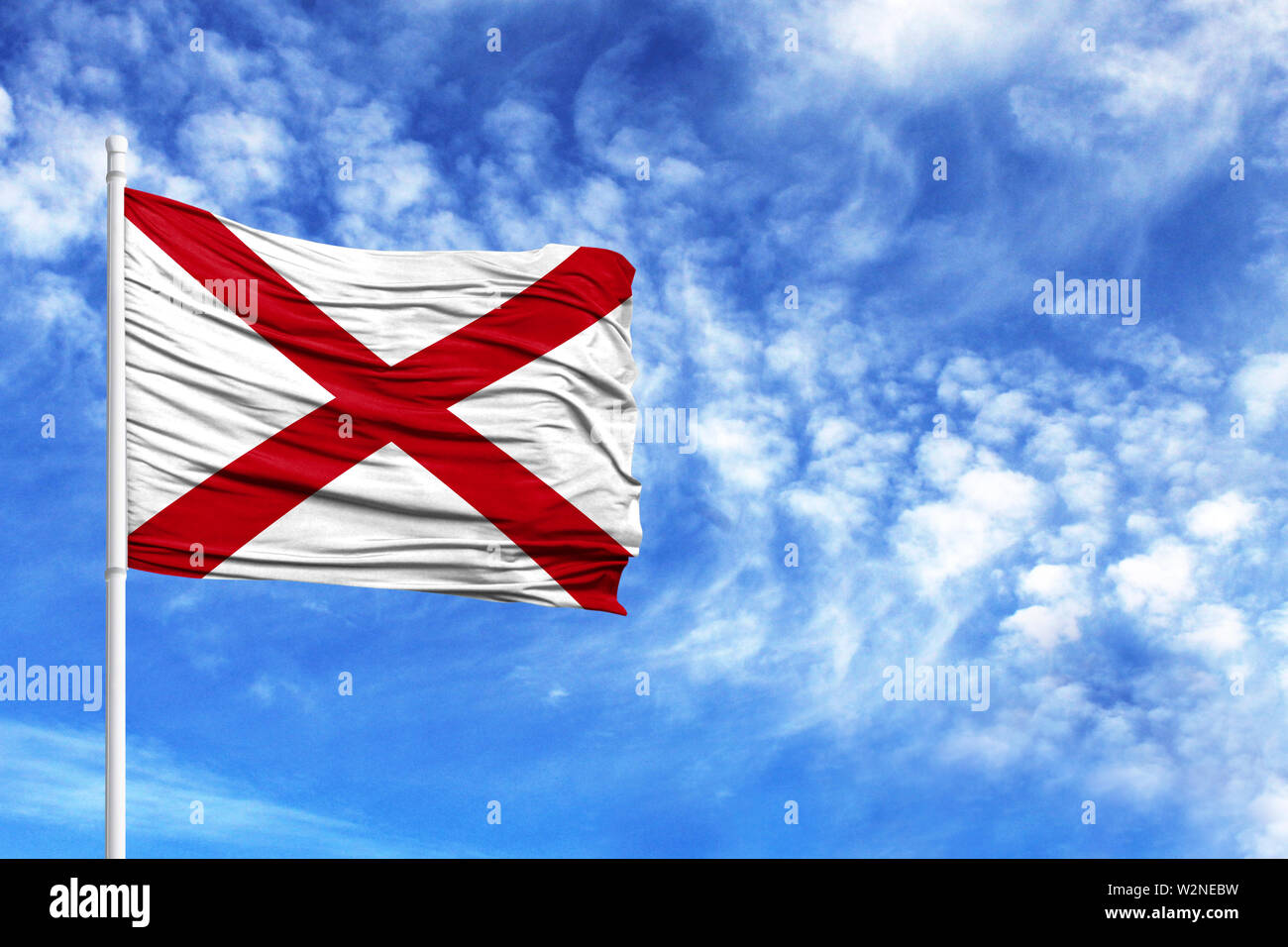 National flag State of Alabama on a flagpole in front of blue sky Stock ...