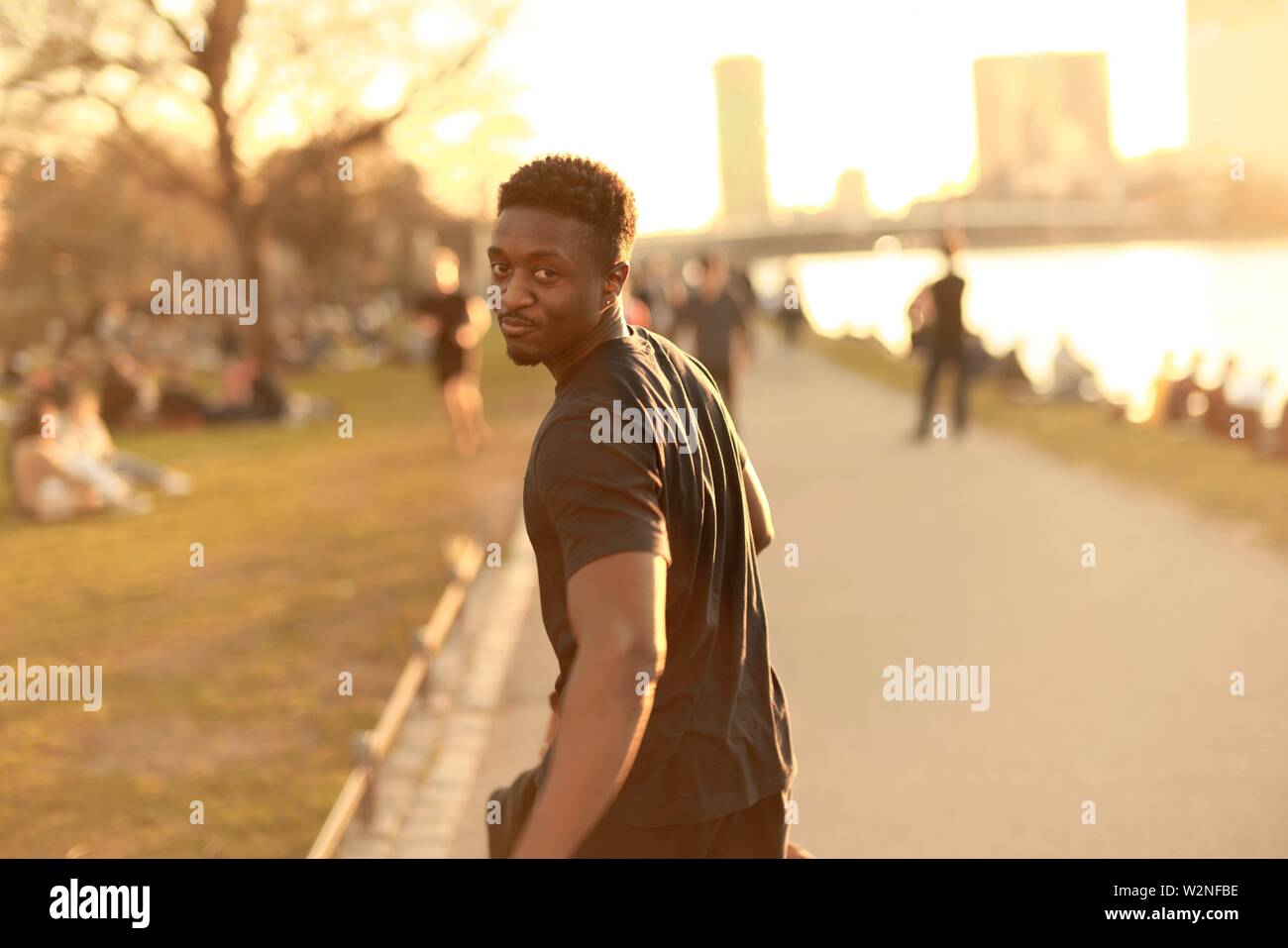Man looking over shoulder running hi-res stock photography and images ...