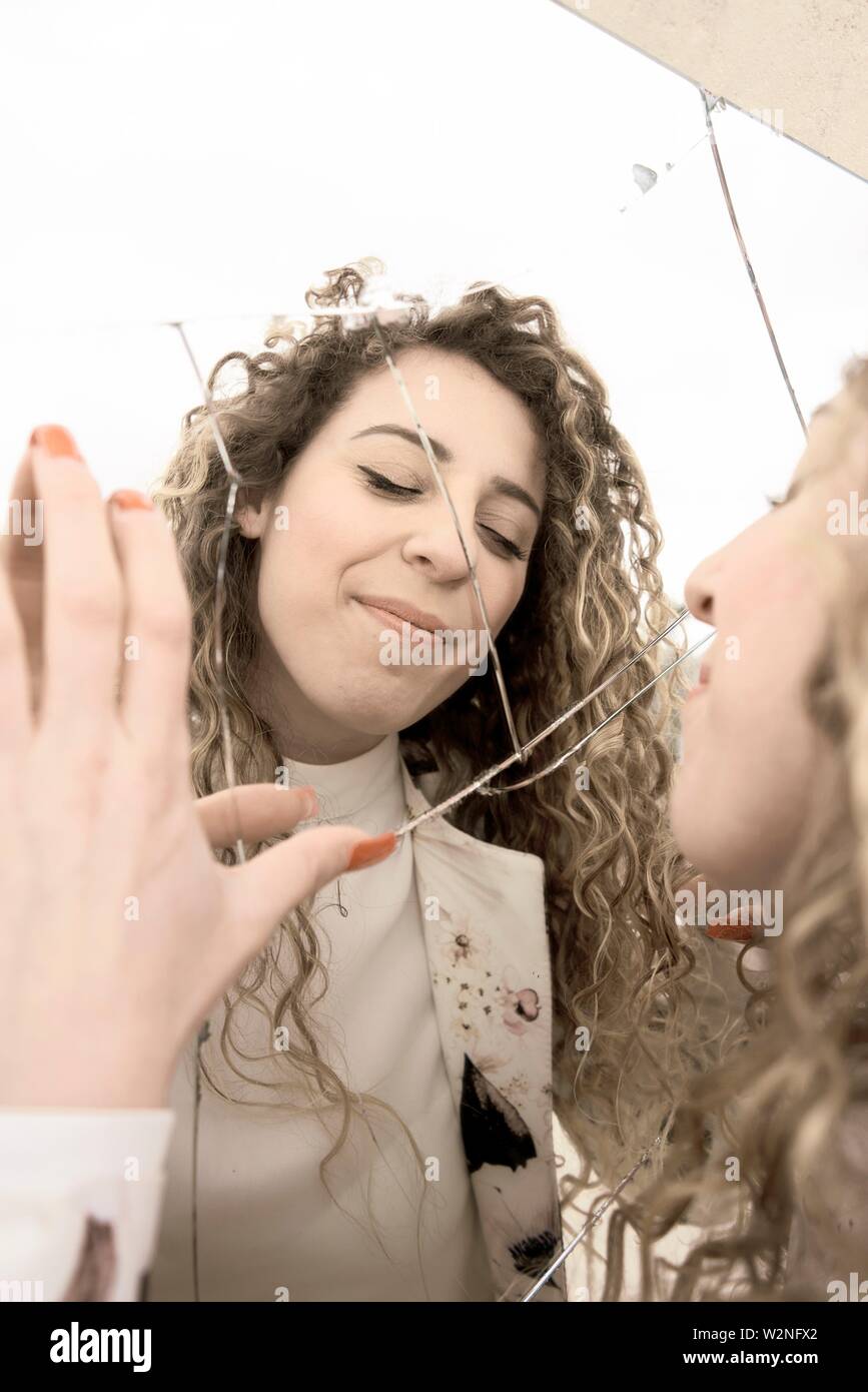 Woman broken mirror hi-res stock photography and images - Alamy