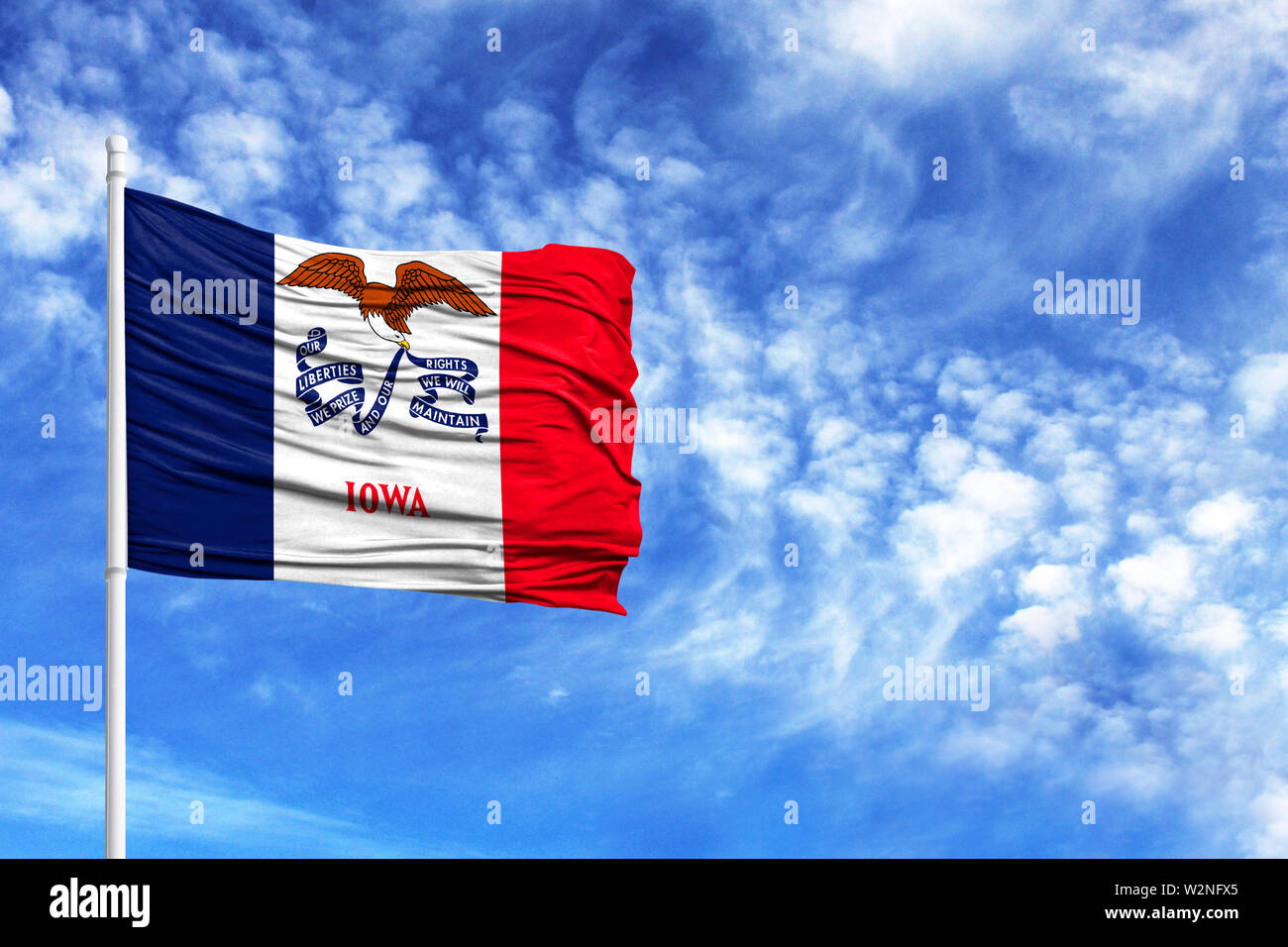 National flag State of Iowa on a flagpole in front of blue sky Stock ...