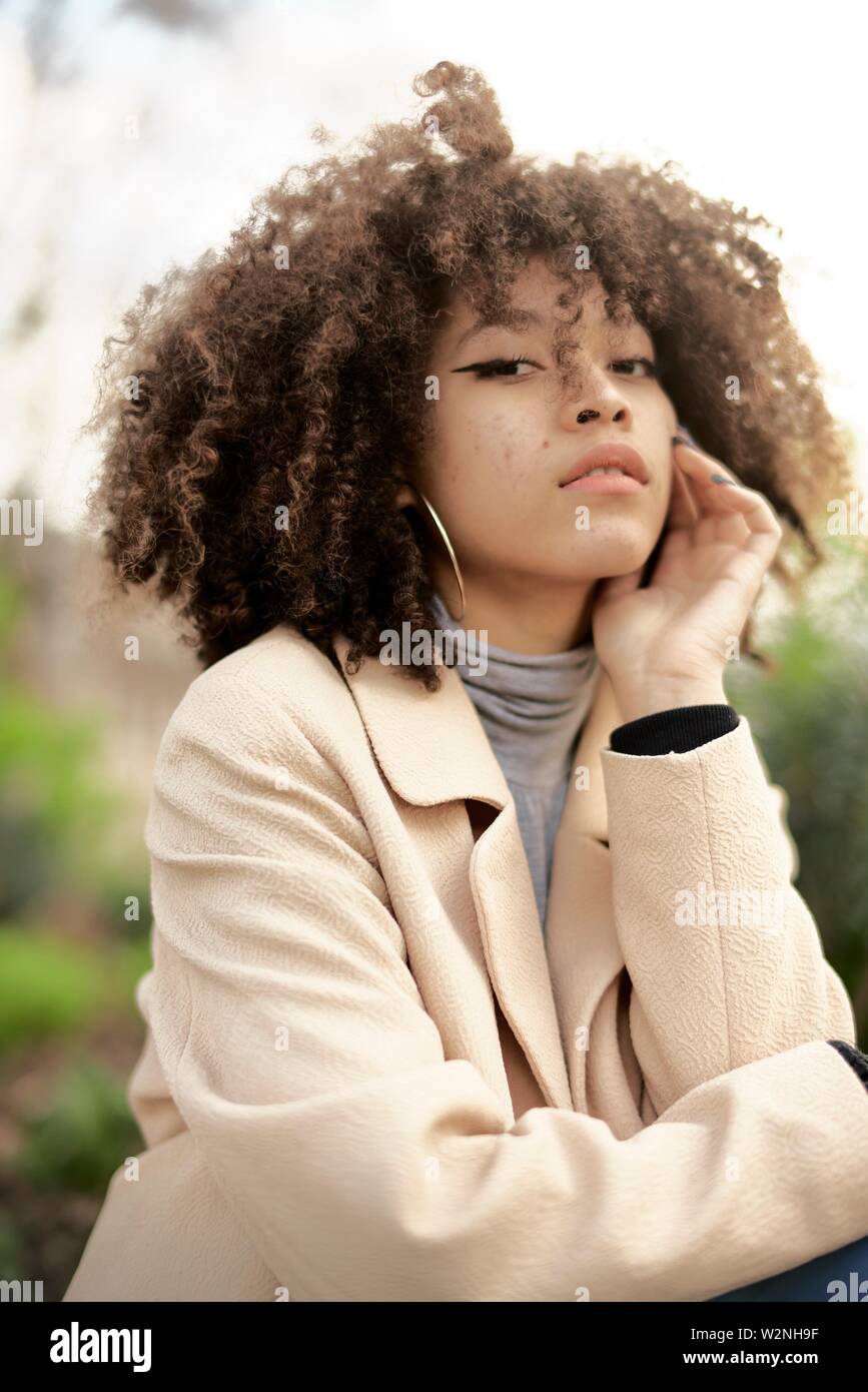 Defiant woman coat hi-res stock photography and images - Alamy