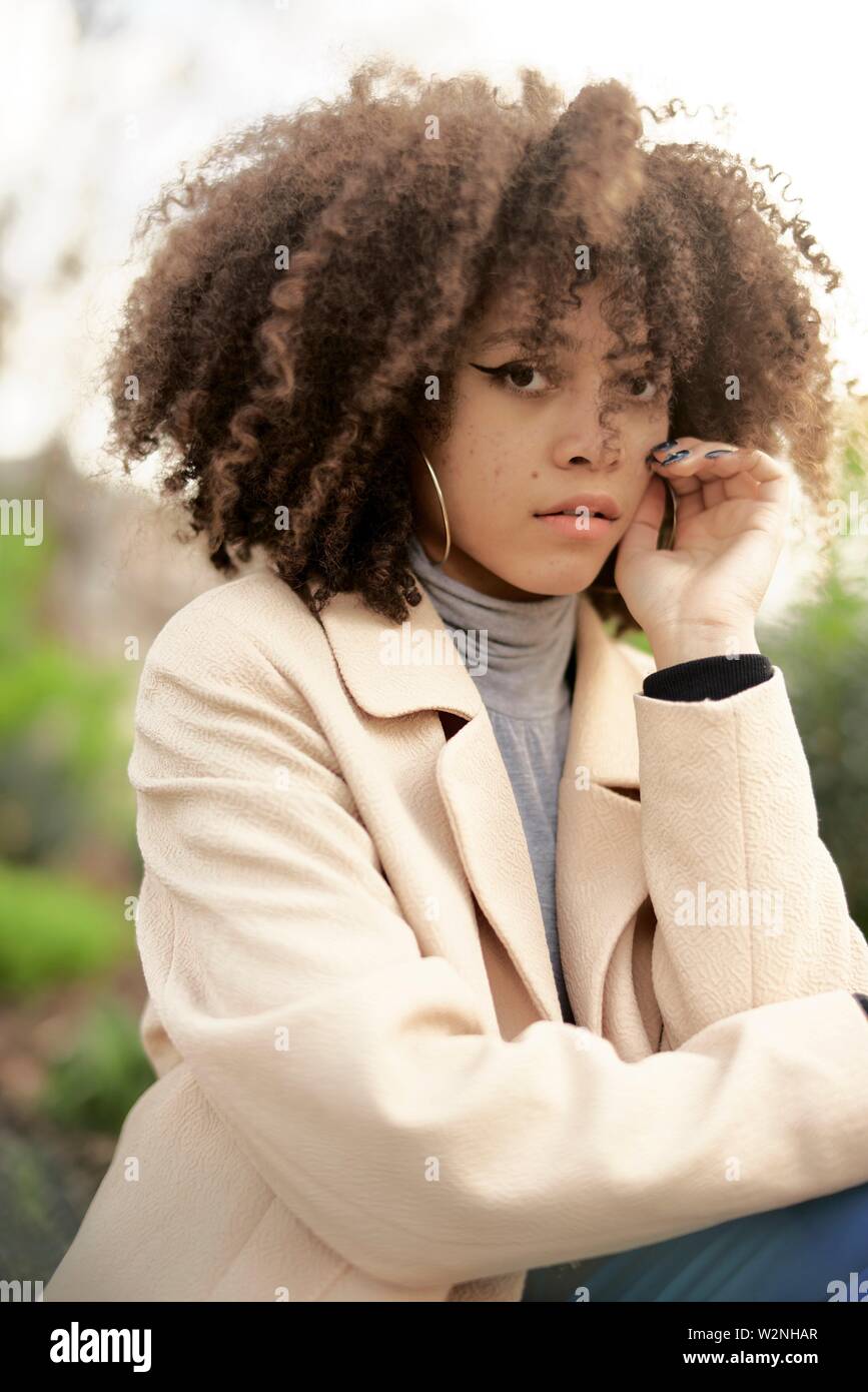 Defiant woman coat hi-res stock photography and images - Alamy