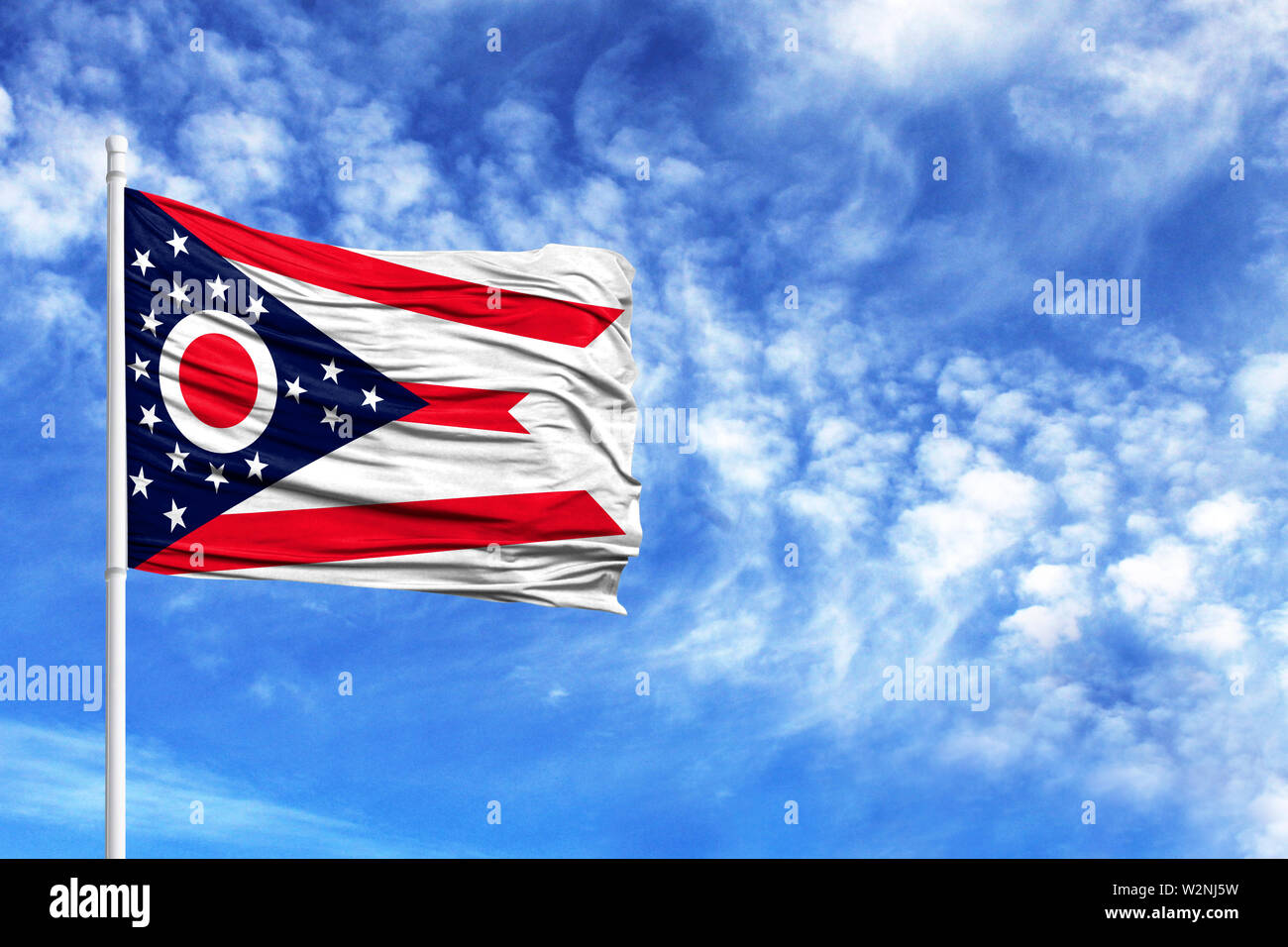 National flag State of Ohio on a flagpole in front of blue sky Stock ...